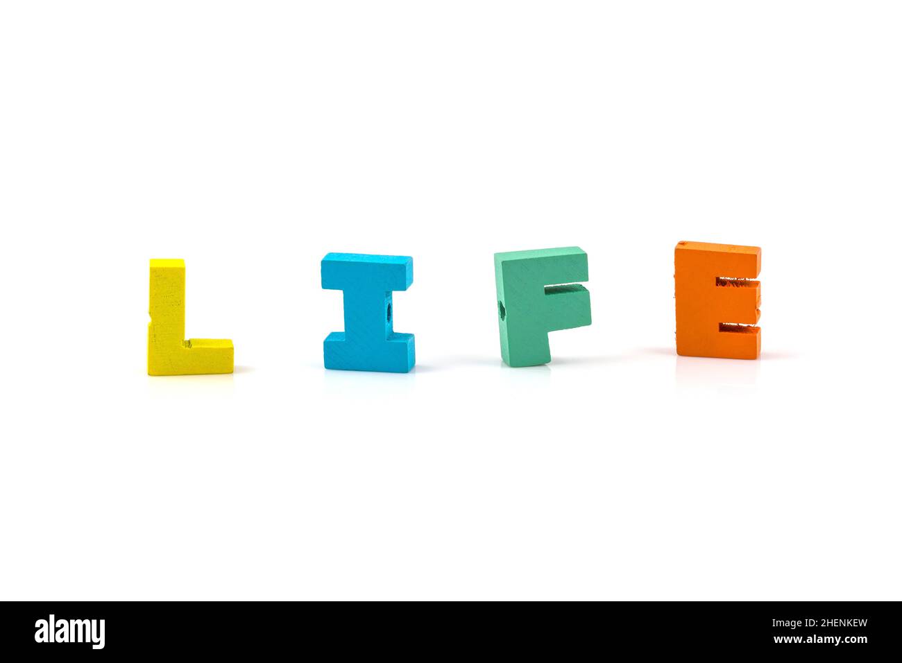 Life word on wood blocks isolated on white background Stock Photo - Alamy