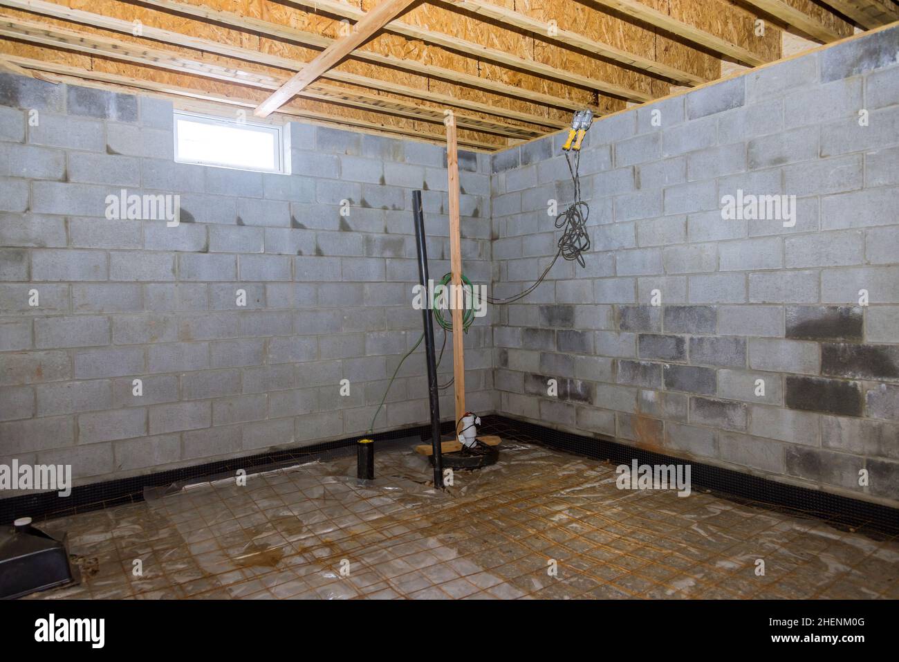 Under construction at the basement for concrete pouring with metal rods ...