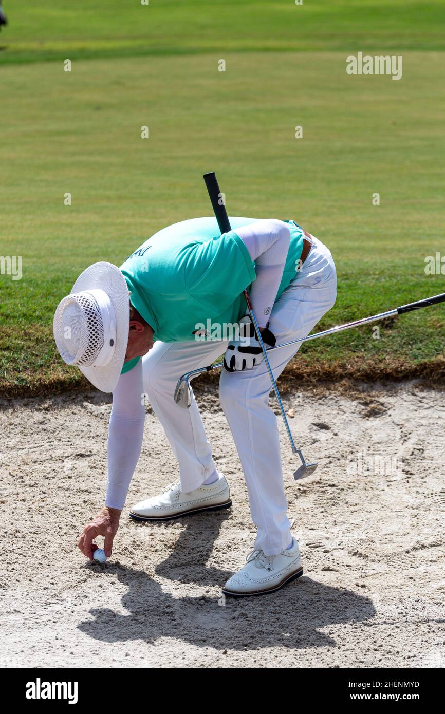 Golf player teeing off. Man hitting golf ball from tee box at Golf Club ...