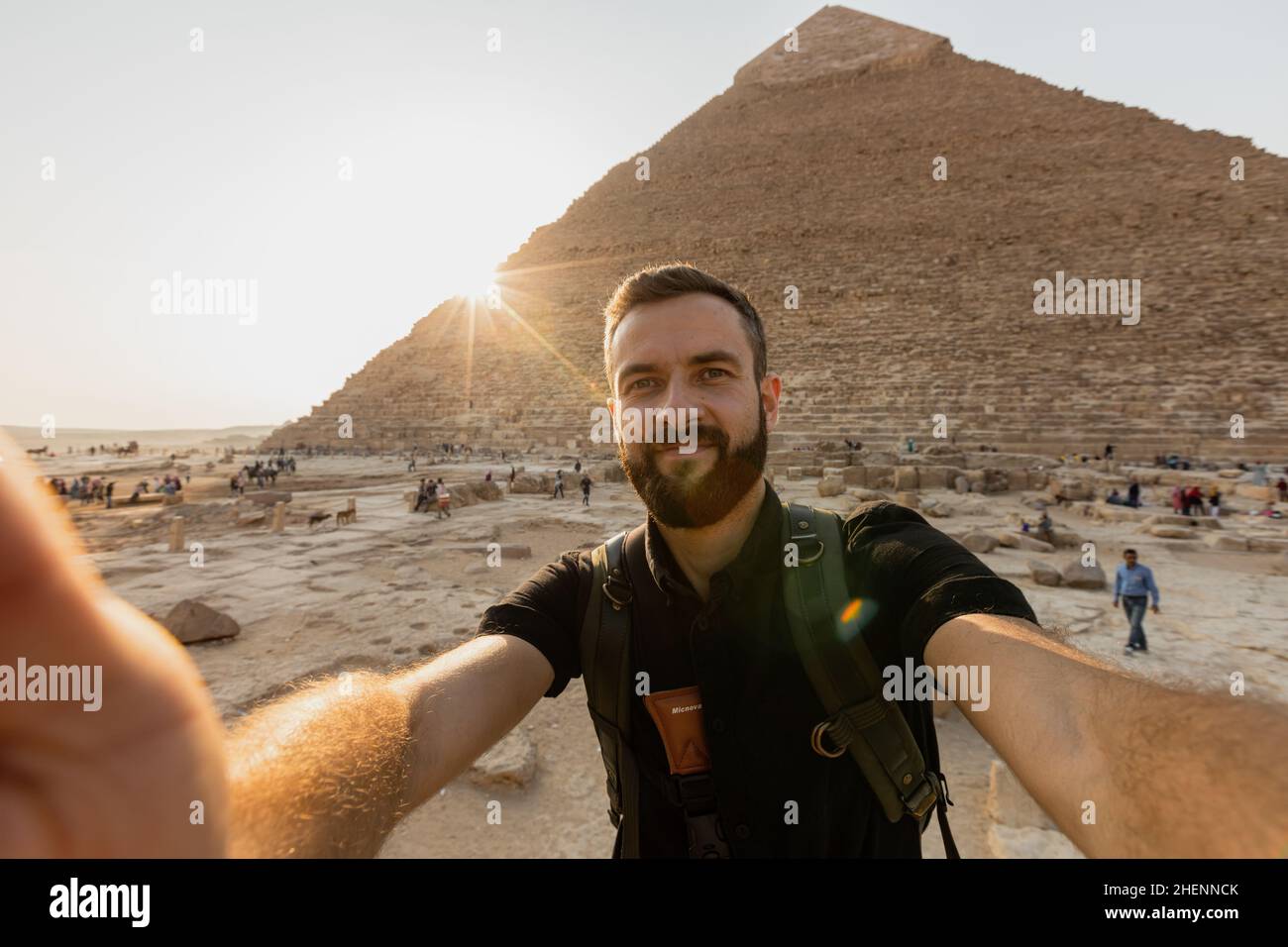 Selfie of a young man with the pyramid on the background, Cairo, Egypt ...
