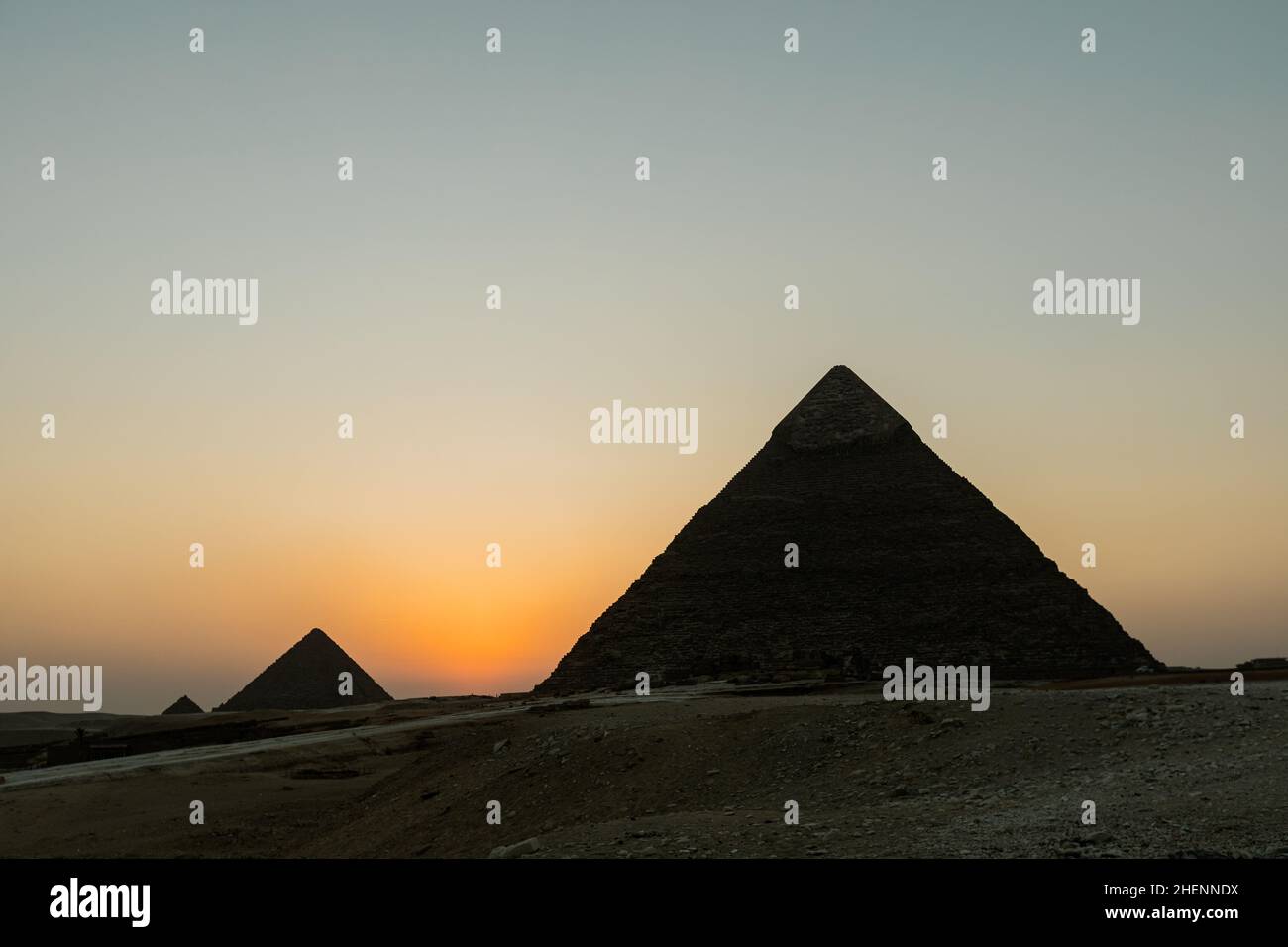 Gentle sunset over the Pyramids of Giza in Egypt Stock Photo - Alamy