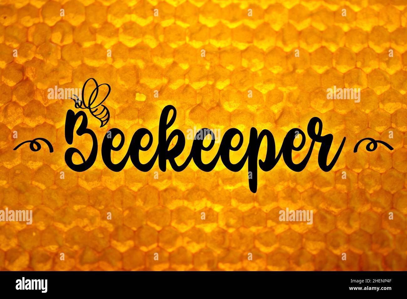 Word BEEKEEPER on honey combs Stock Photo - Alamy