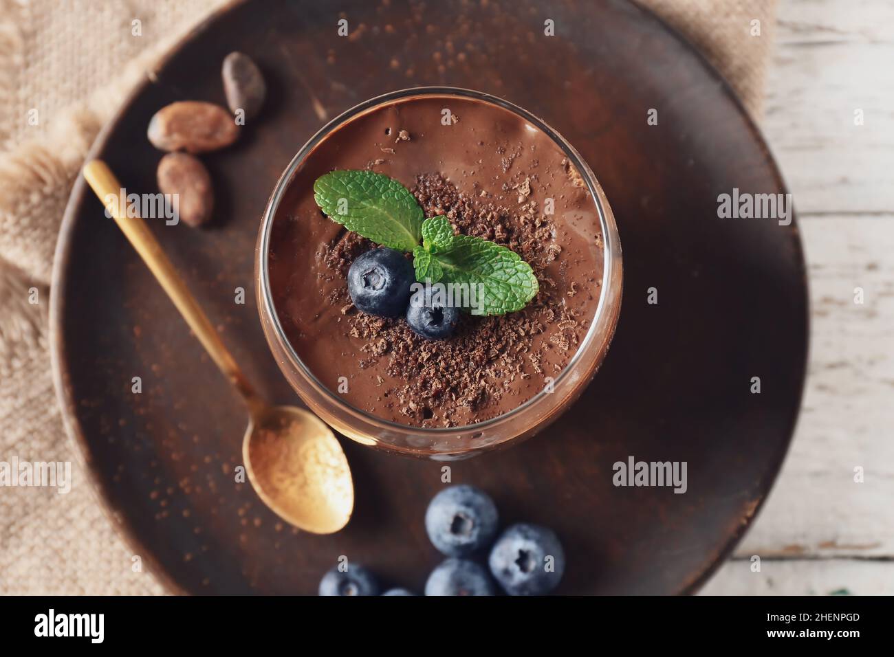 Glass of sweet cocoa dessert on plate Stock Photo - Alamy