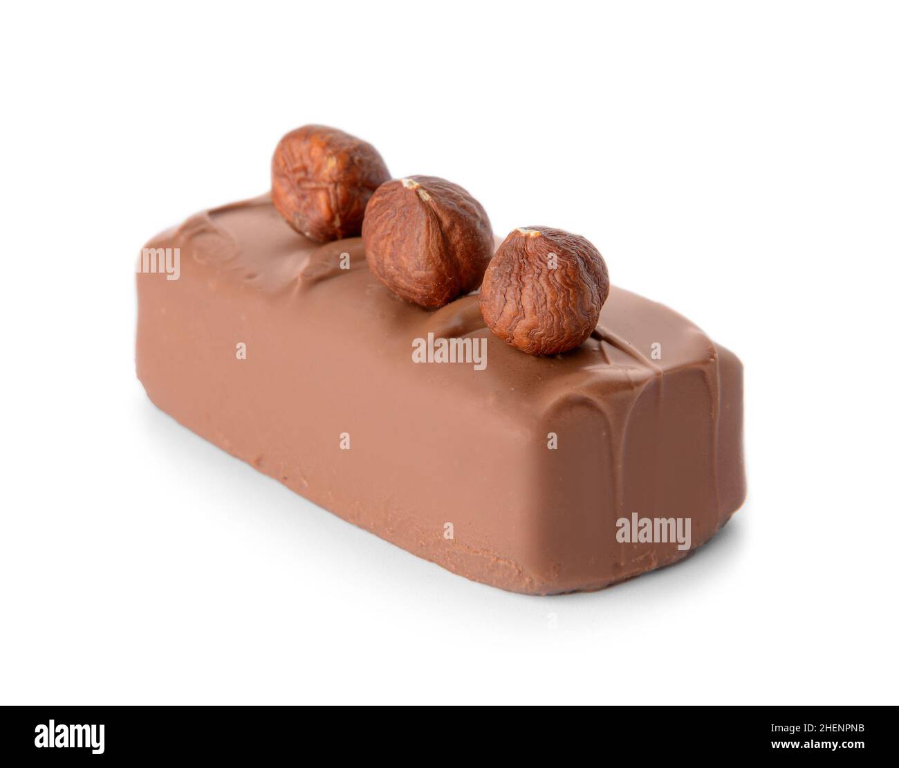 Tasty chocolate nut bar on white background Stock Photo - Alamy