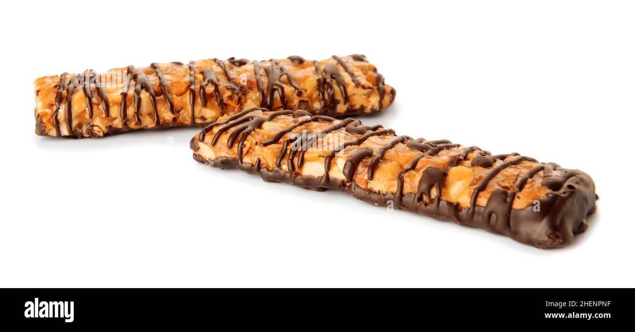 Tasty chocolate nut bars on white background Stock Photo - Alamy