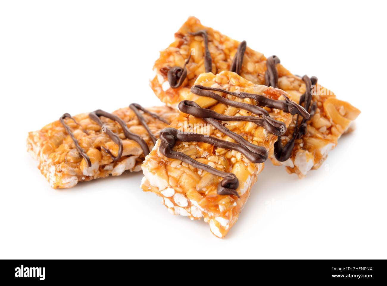 Tasty chocolate nut bars on white background Stock Photo - Alamy