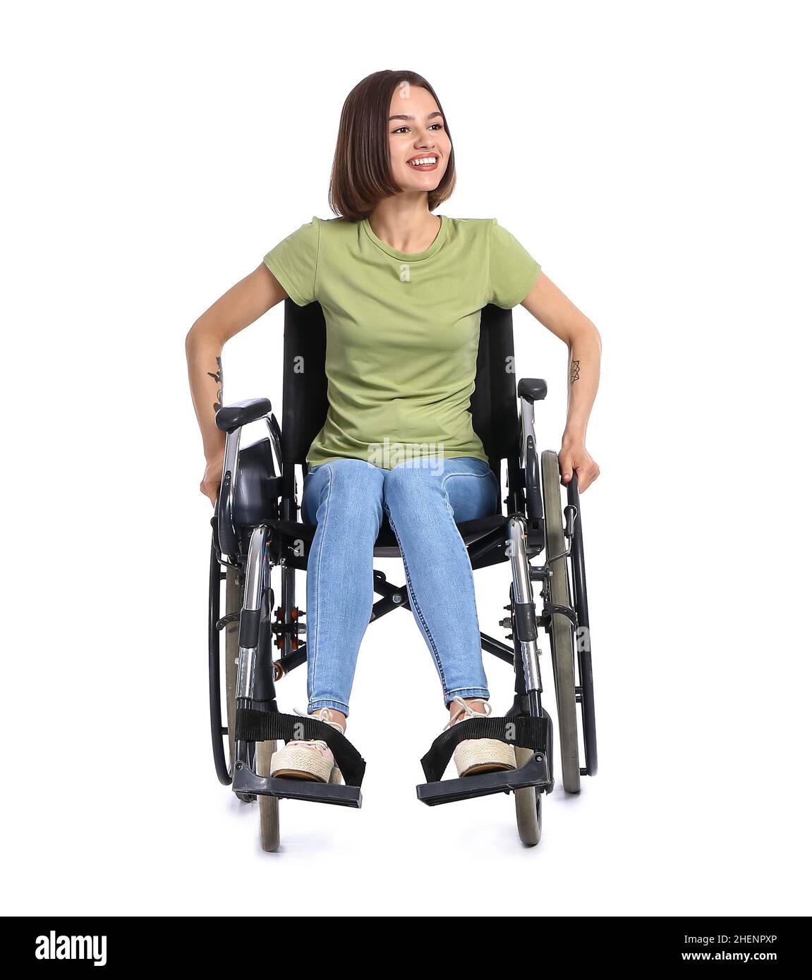 Young woman in wheelchair on white background Stock Photo - Alamy