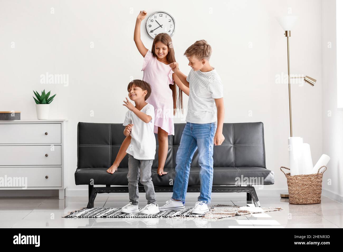 Happy children dancing at home Stock Photo - Alamy