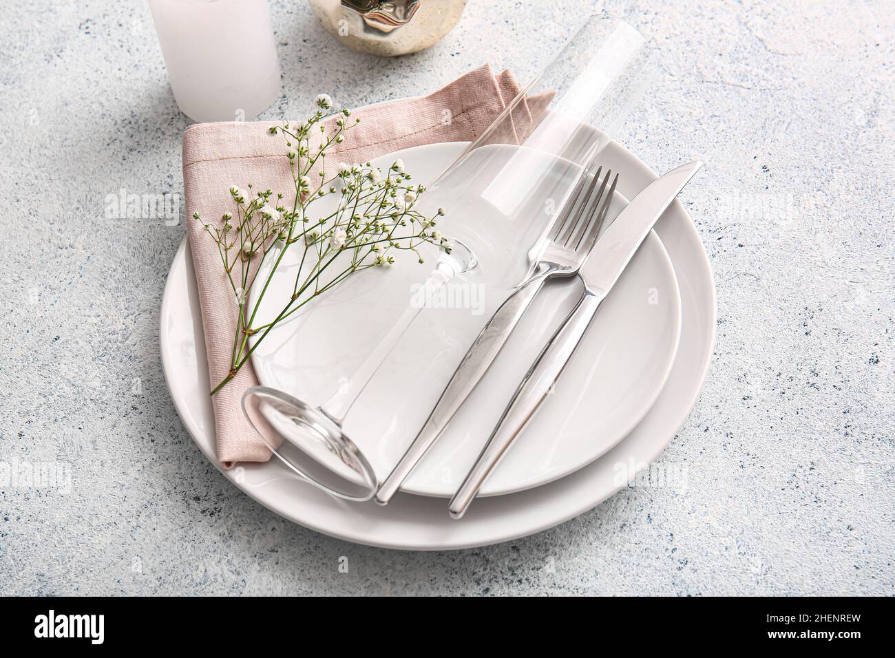 Beautiful table setting for wedding with gypsophila flowers on light ...