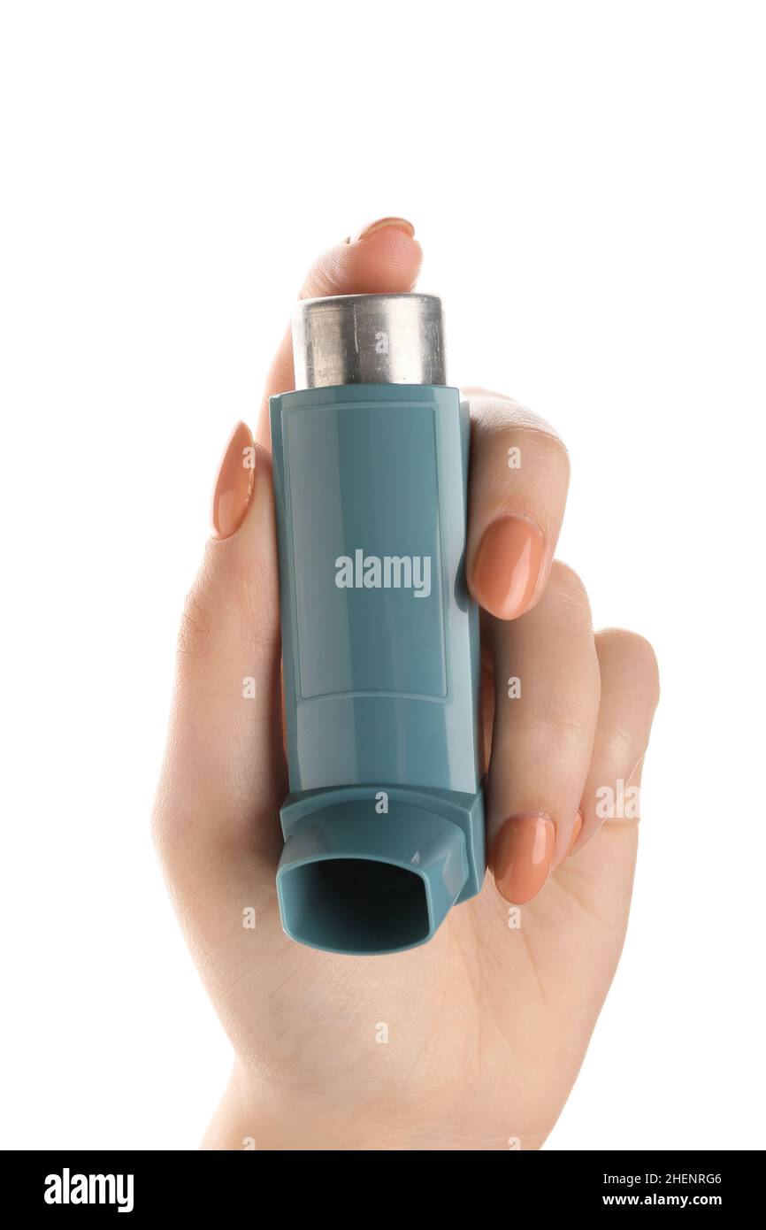 Female hand with asthma inhaler on white background, closeup Stock ...