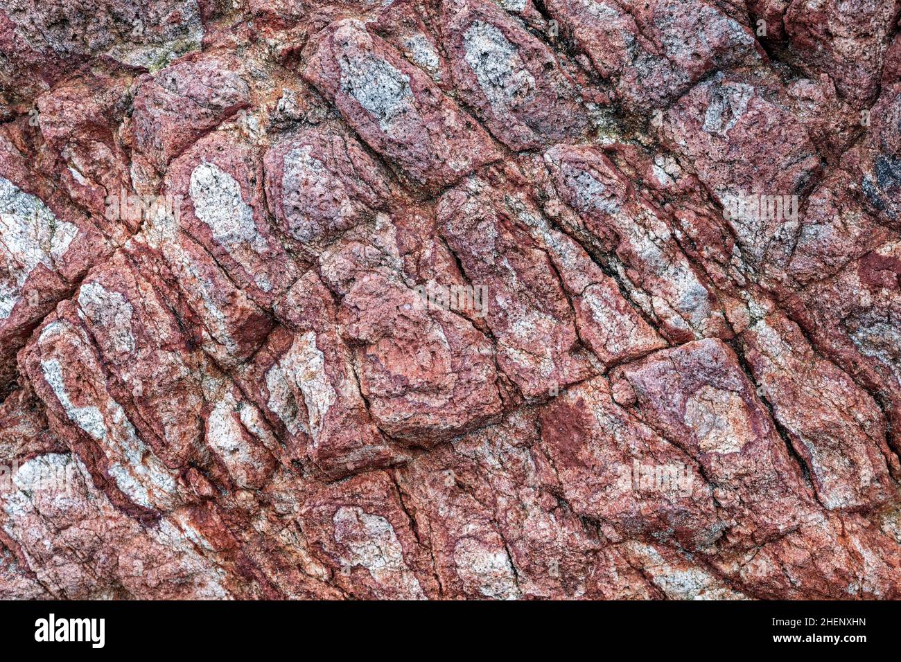 Detail of red rock formations on the beach at Harris Beach State Park ...