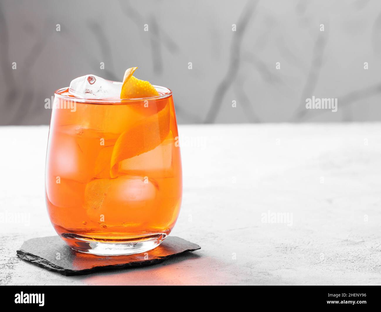 Negroni cocktail on a light background. Copy space Stock Photo - Alamy