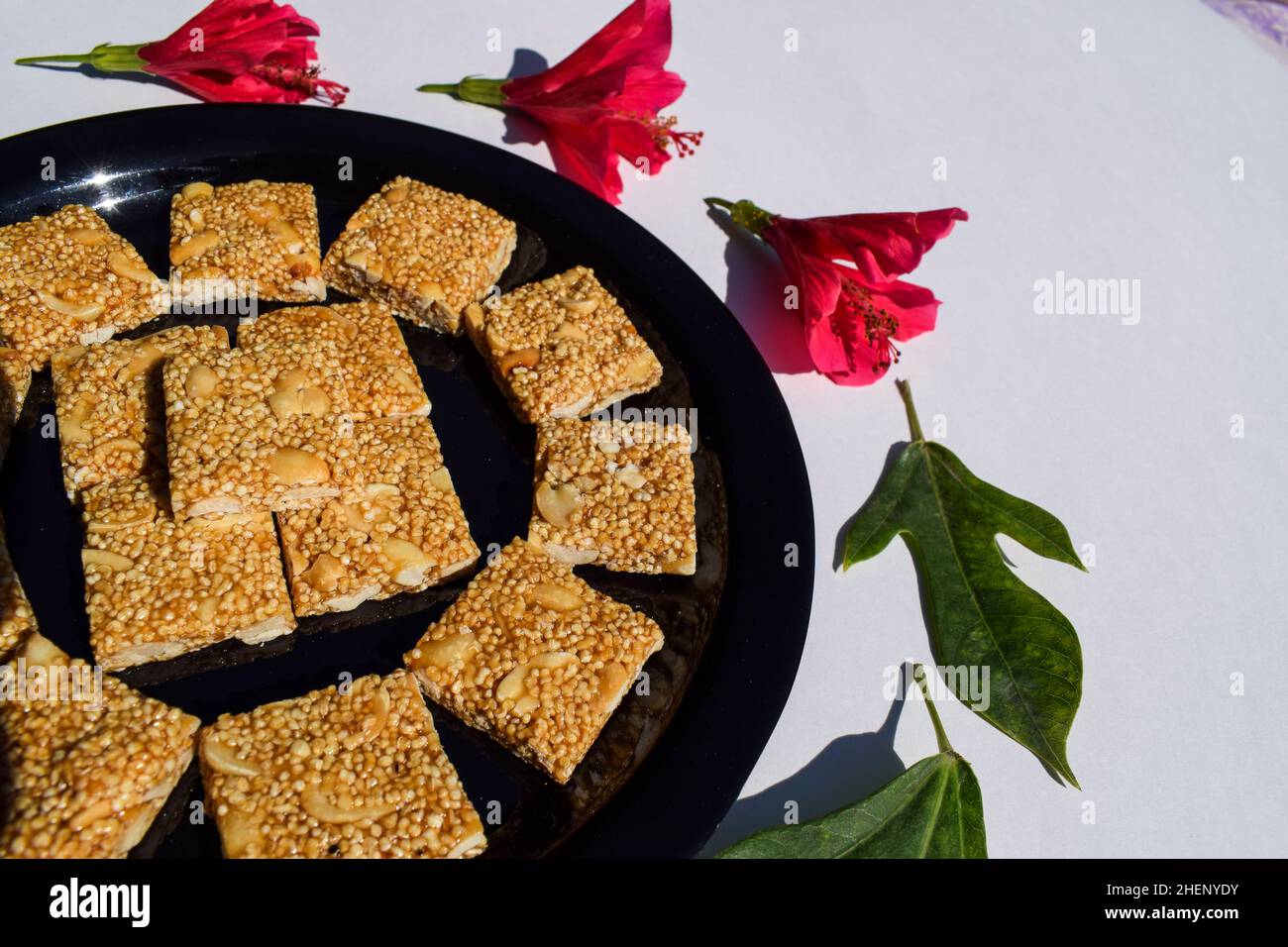 Makar sankranti special food sweet item dish Rajgira peanut chikki or ...