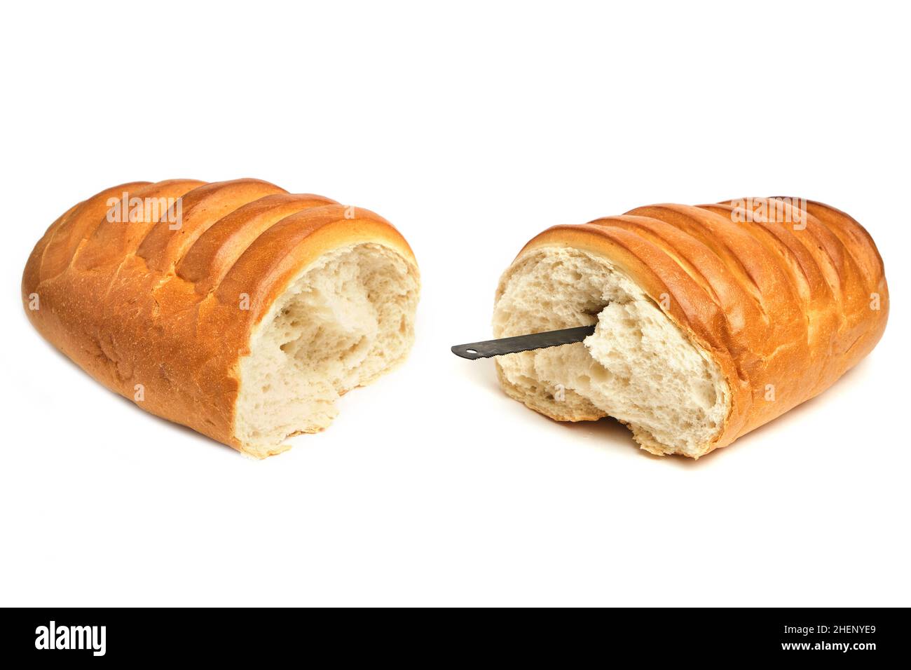 Loaf loaf broken in half, with hacksaw for metal inside.Tool, concept ...