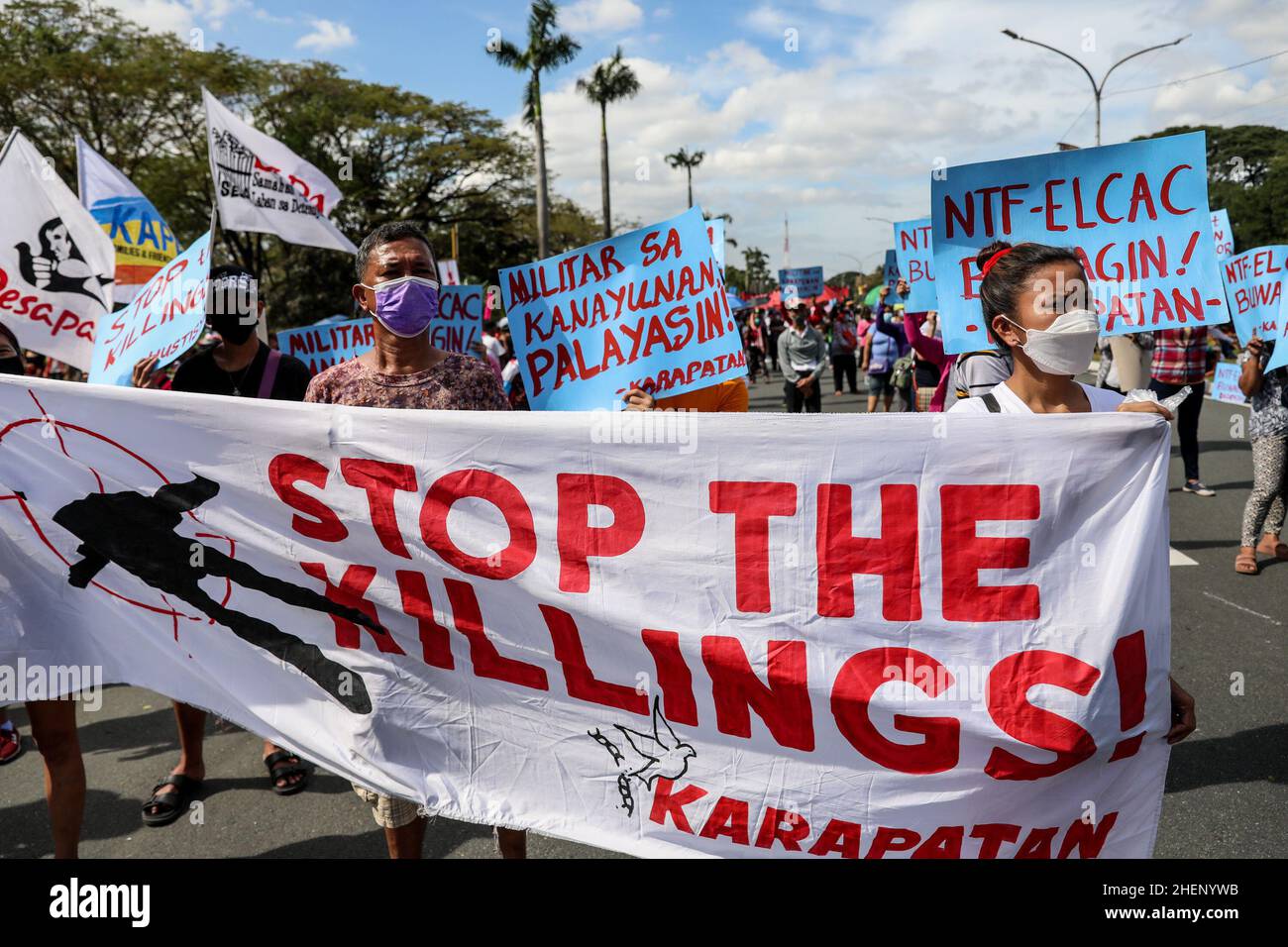 Manila, Philippines. 10th Dec, 2021. Protesters carry signs during a ...