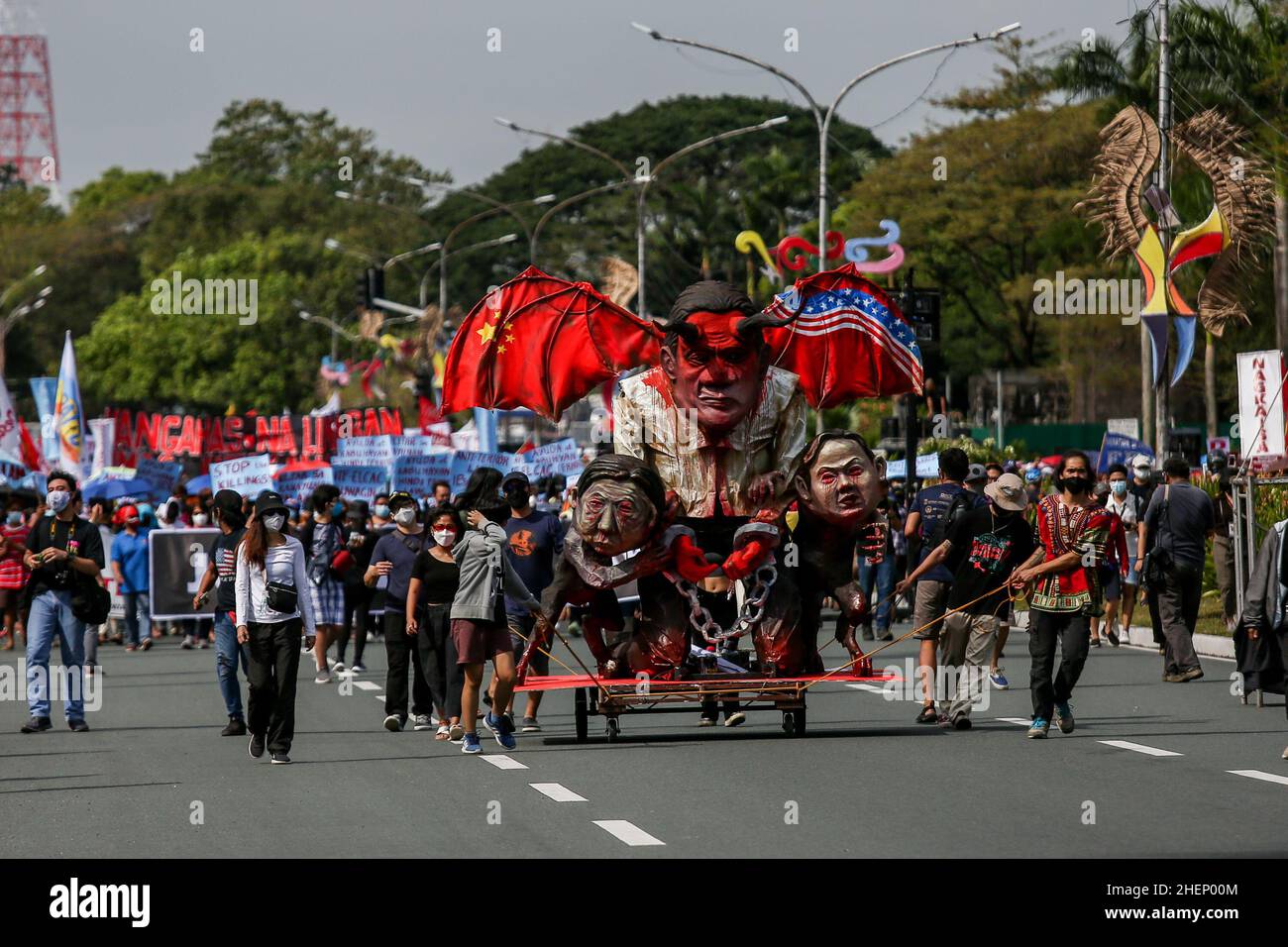 December 10, 2021, Manila, Philippines: Protesters pull an effigy of ...