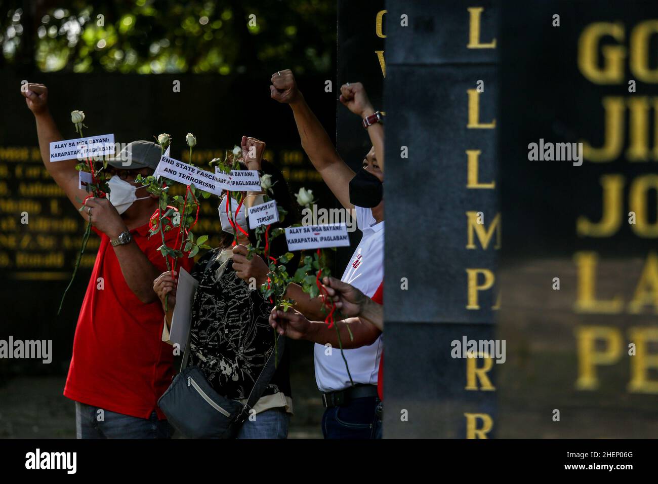 Manila, Philippines. 10th Dec, 2021. Human rights activists carry signs ...