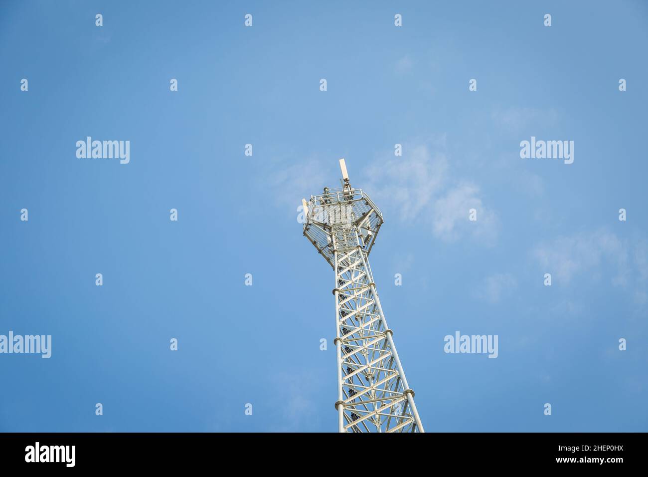 White Telephone pole with clear blue sky background Stock Photo - Alamy