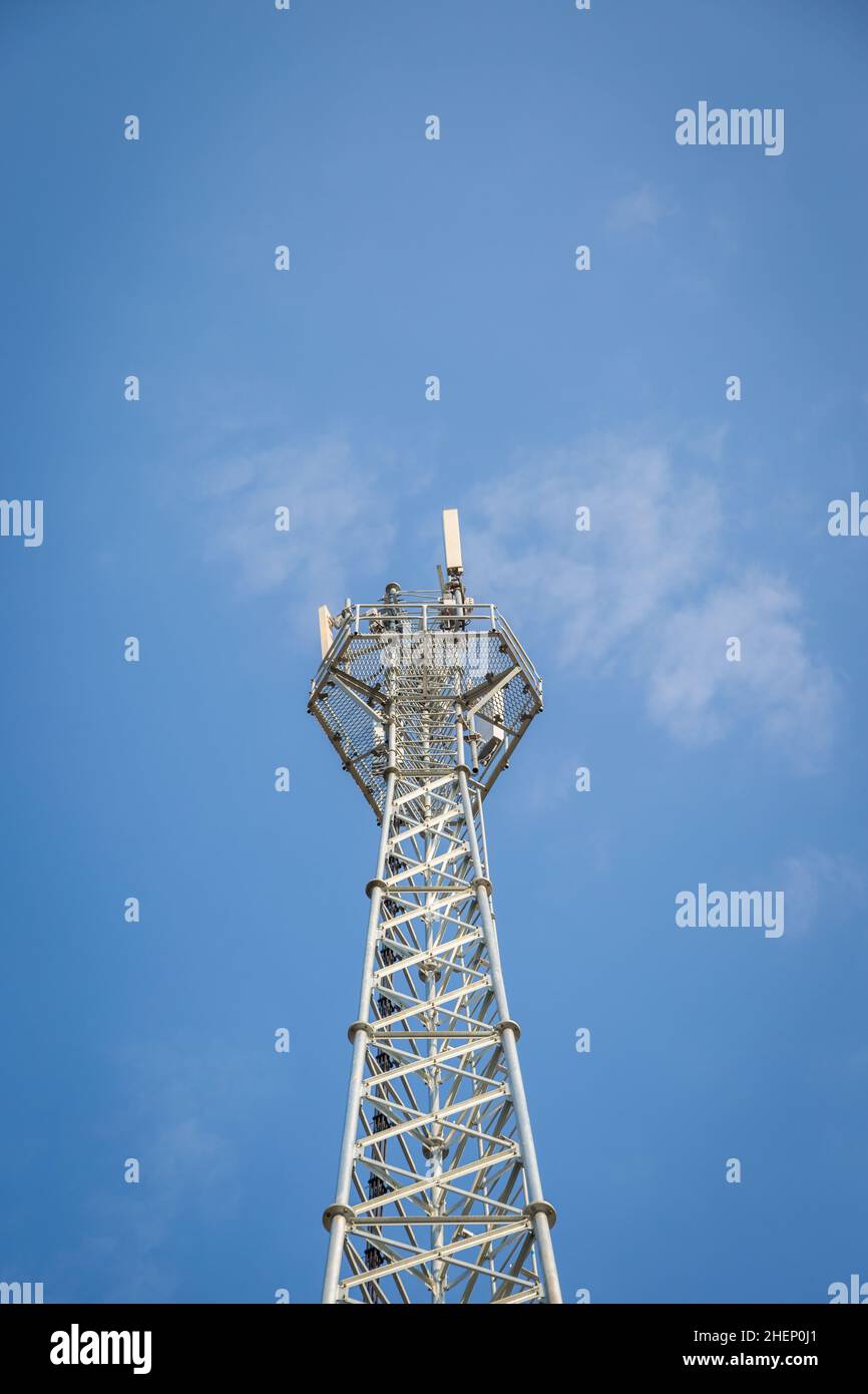 White Telephone pole with clear blue sky background Stock Photo - Alamy