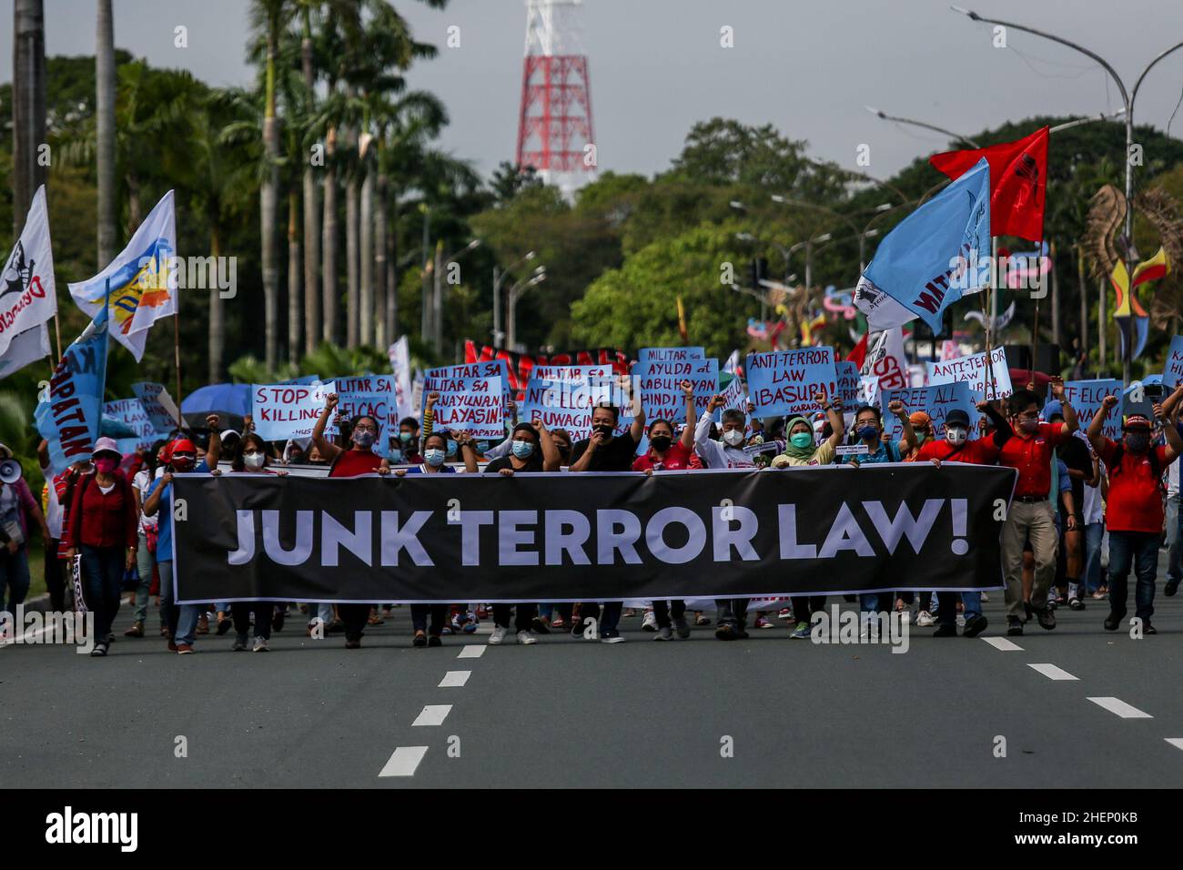 Manila, Philippines. 10th Dec, 2021. Protesters carry signs as they ...
