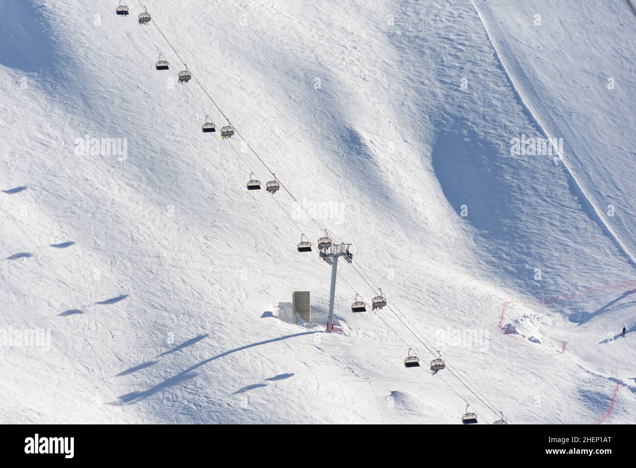Ski lifts snowy slope for skiing Stock Photo - Alamy