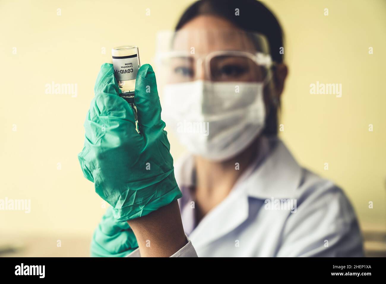 Skillful doctor prepare vaccine proficiently before injection . Covid ...