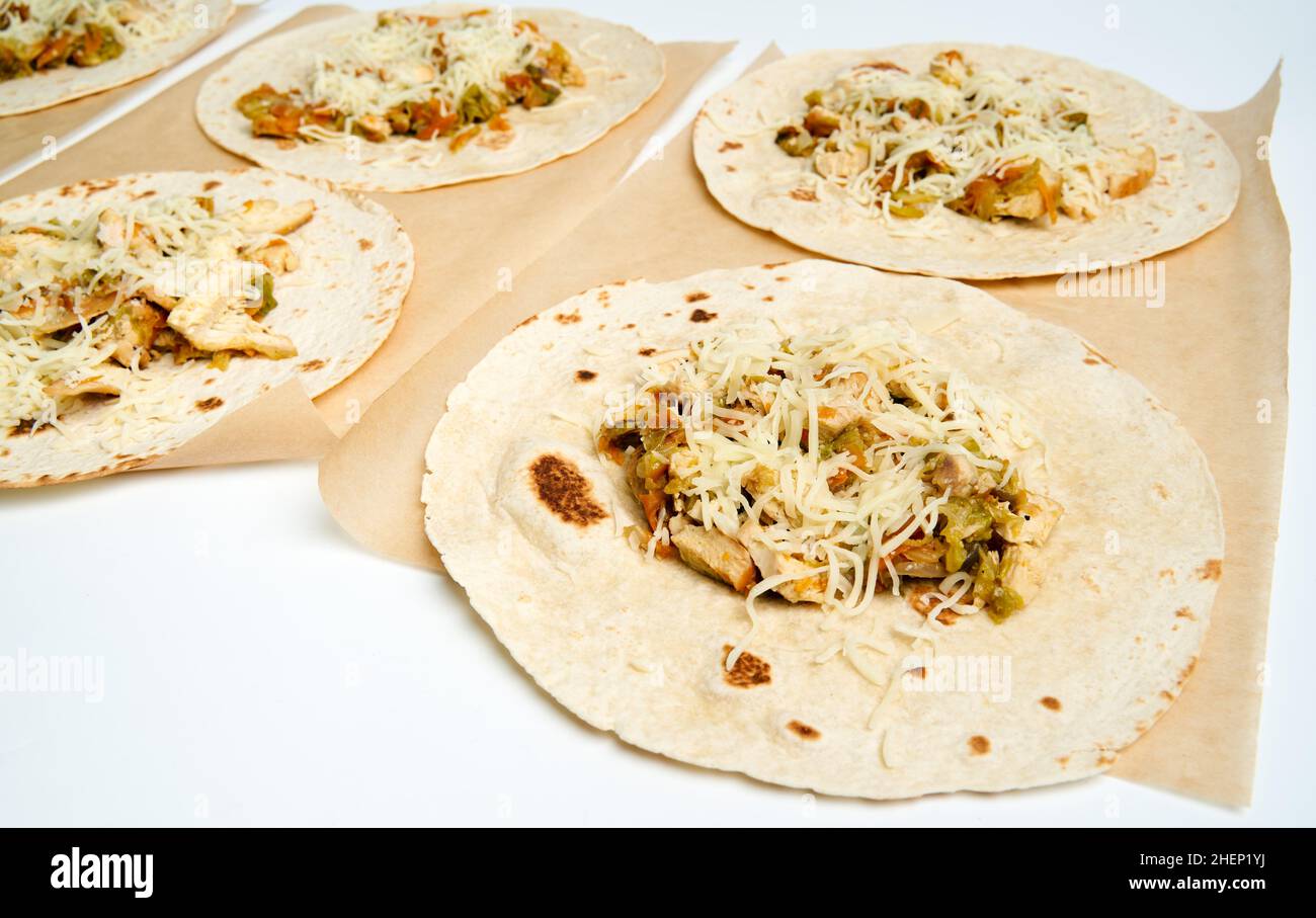 Closeup of burritos isolated on white background Stock Photo - Alamy