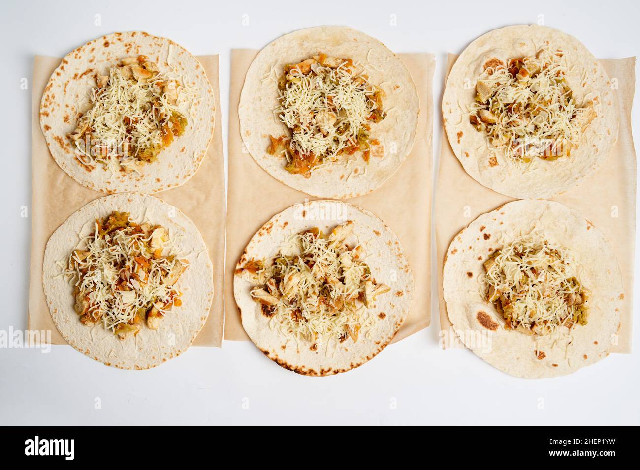 Closeup of burritos isolated on white background Stock Photo - Alamy
