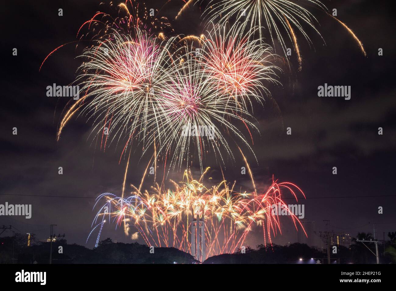 Manila, Philippines. 1st Jan, 2022. Fireworks display light up the sky ...