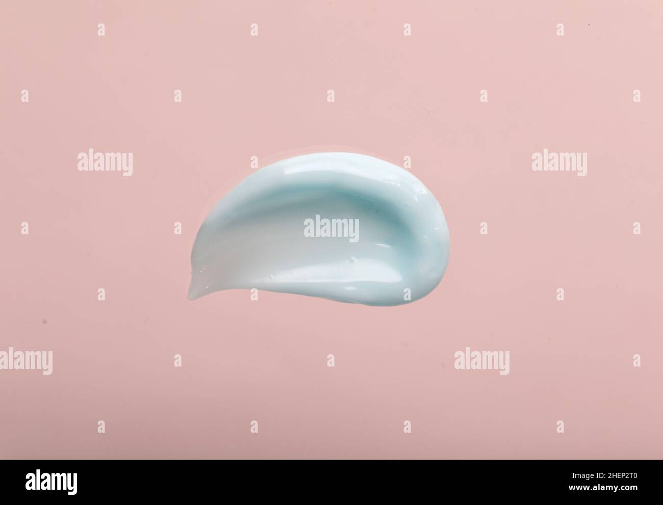 Liquid blue cream cosmetic, smudge texture pastel beige background ...
