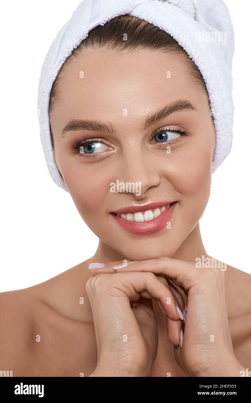 Happy Woman With Moisturized Fresh Skin With Towel On Head After Bath