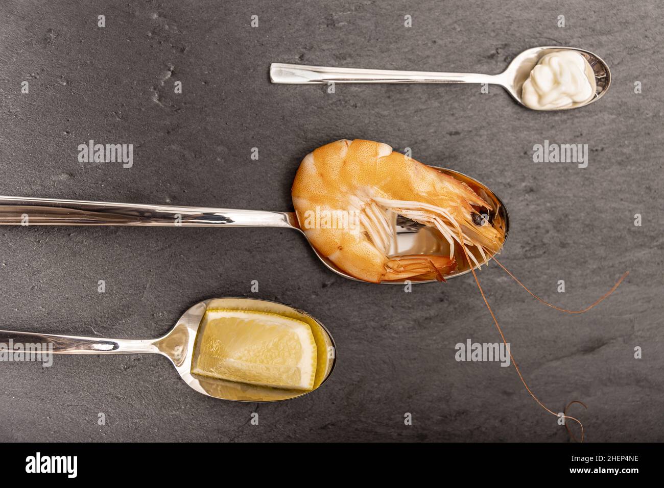 Roasted tails of shrimps with fresh rosemary and lemon Stock Photo - Alamy