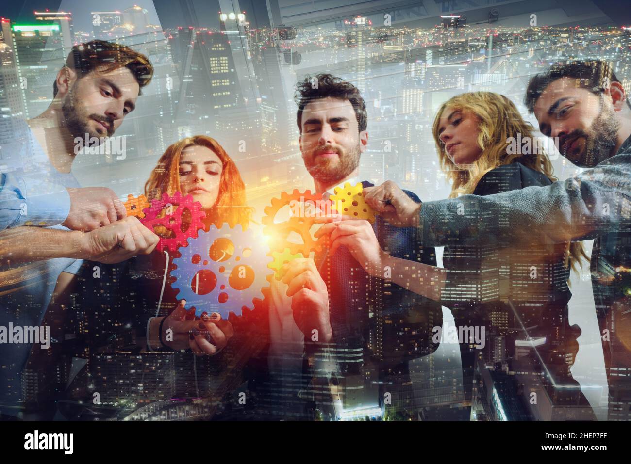 Business team connect pieces of gears as teamwork and partner Stock ...