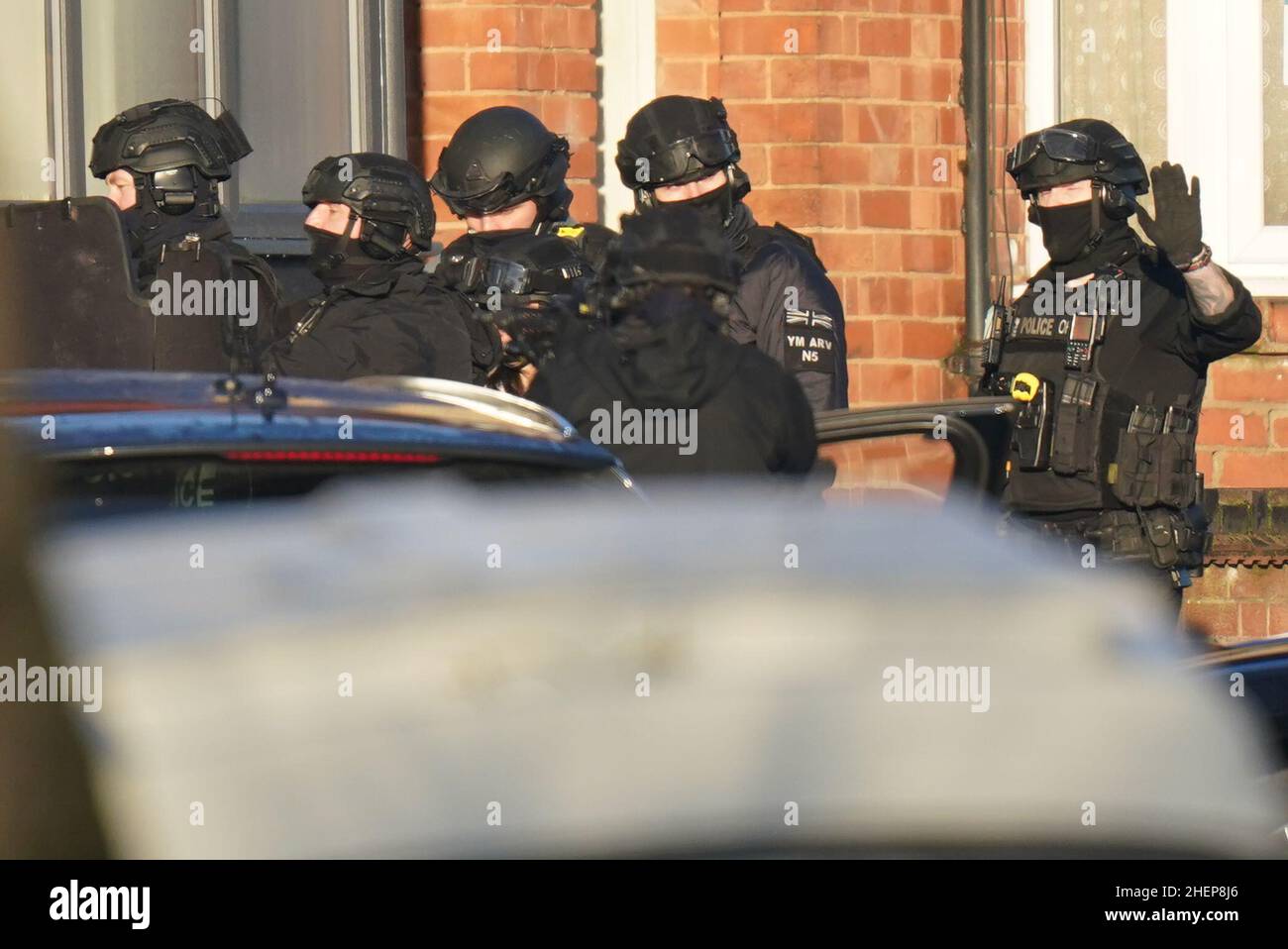 Armed police officers outside a property in Earlsdon Avenue North ...