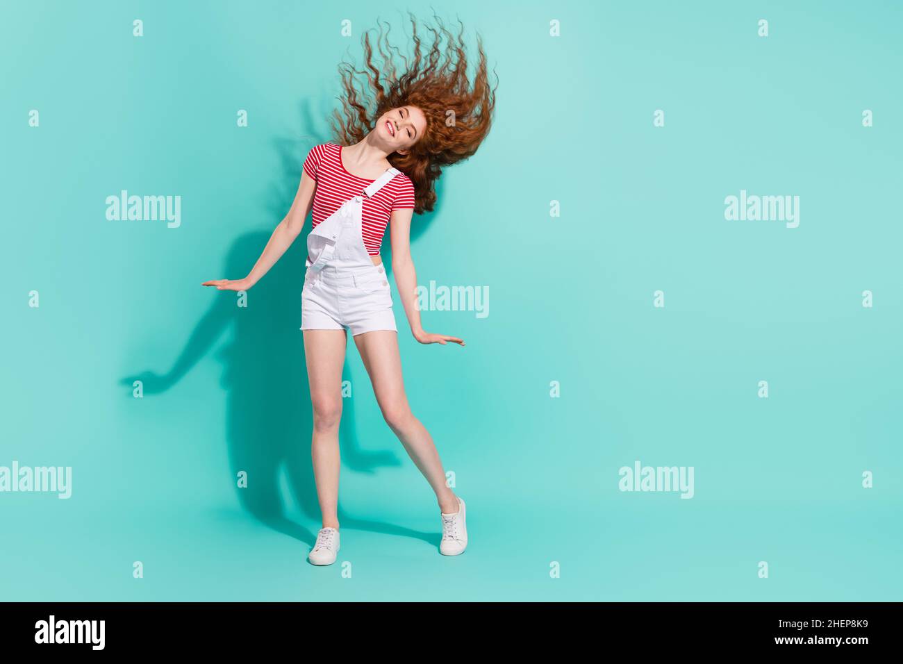 Full length body size view of nice-looking cheerful girl throwing hair ...