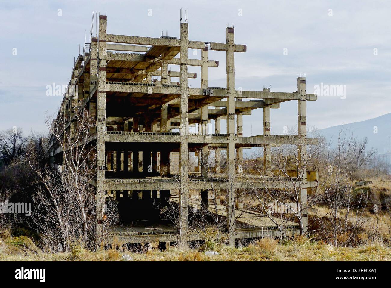Unfinished and abandoned concrete building carcass. Abandoned building ...