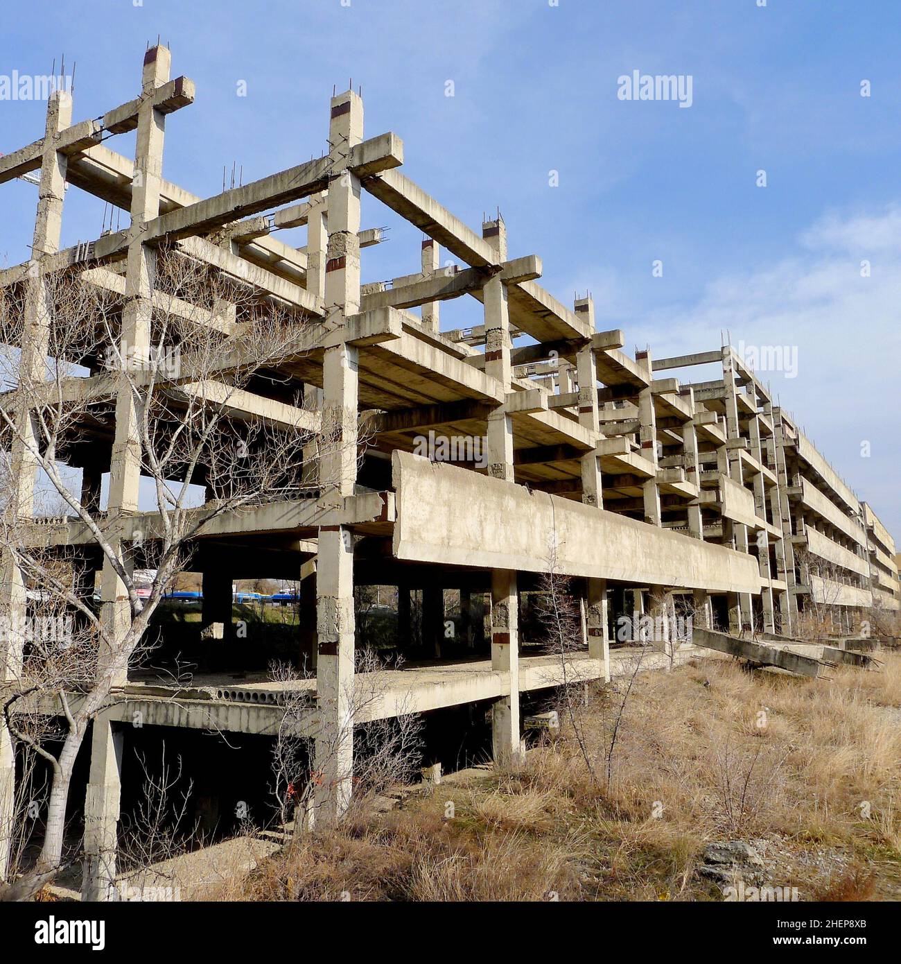 Unfinished and abandoned concrete building carcass. Abandoned building ...