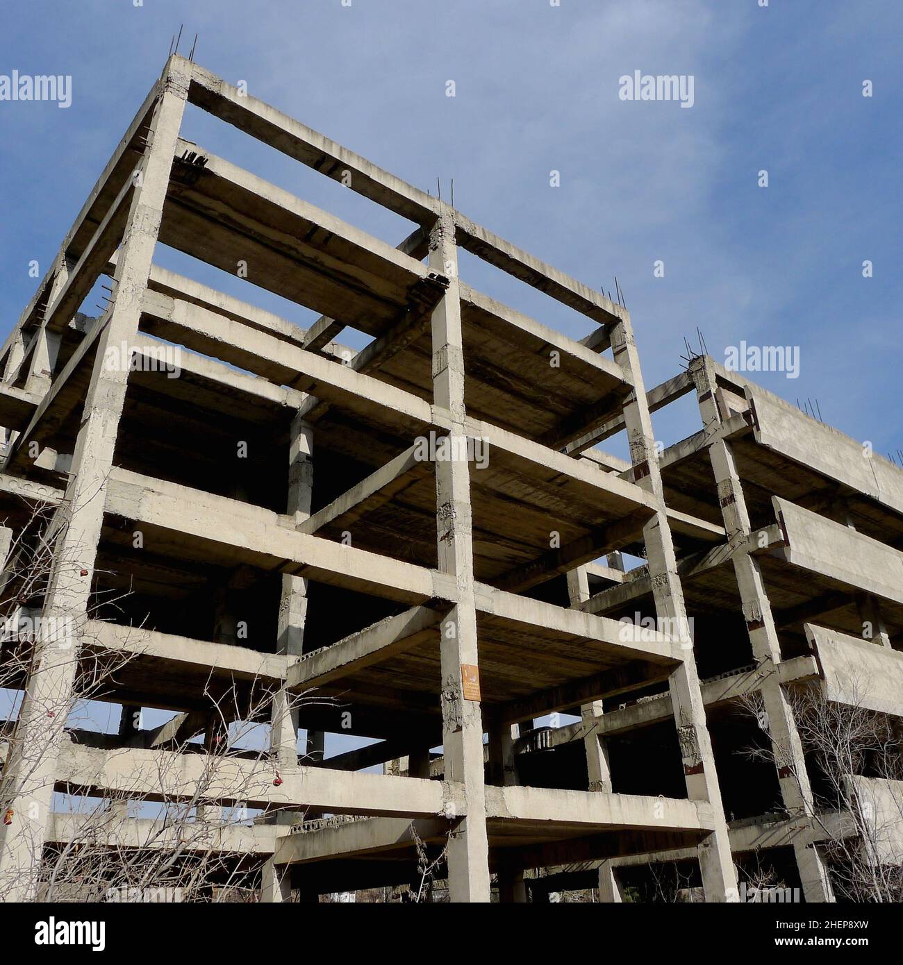 Unfinished and abandoned concrete building carcass. Abandoned building ...