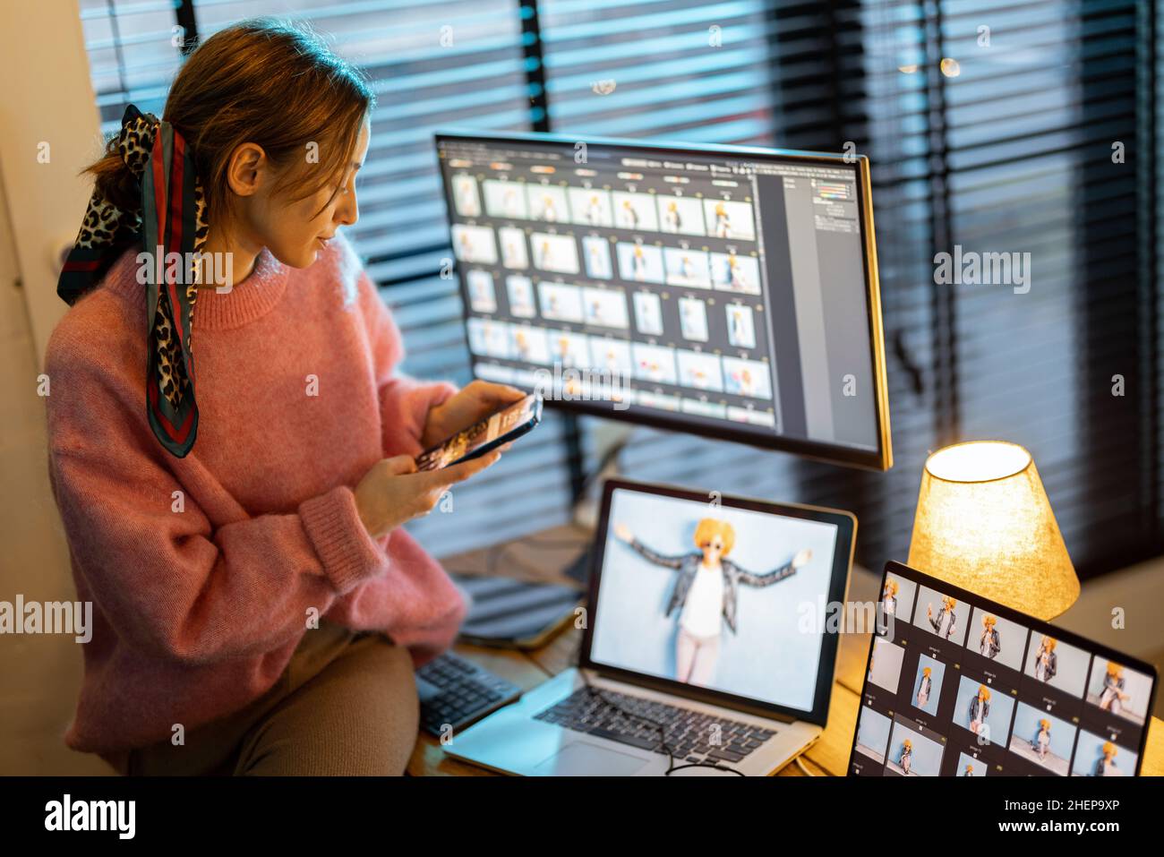 Professional photographer working photos table hi-res stock photography ...