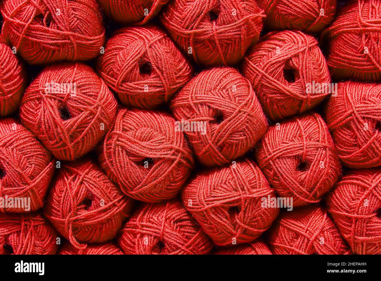 Red Ball of wool. Beautiful colored wools ball. Wool texture. Skeins of ...