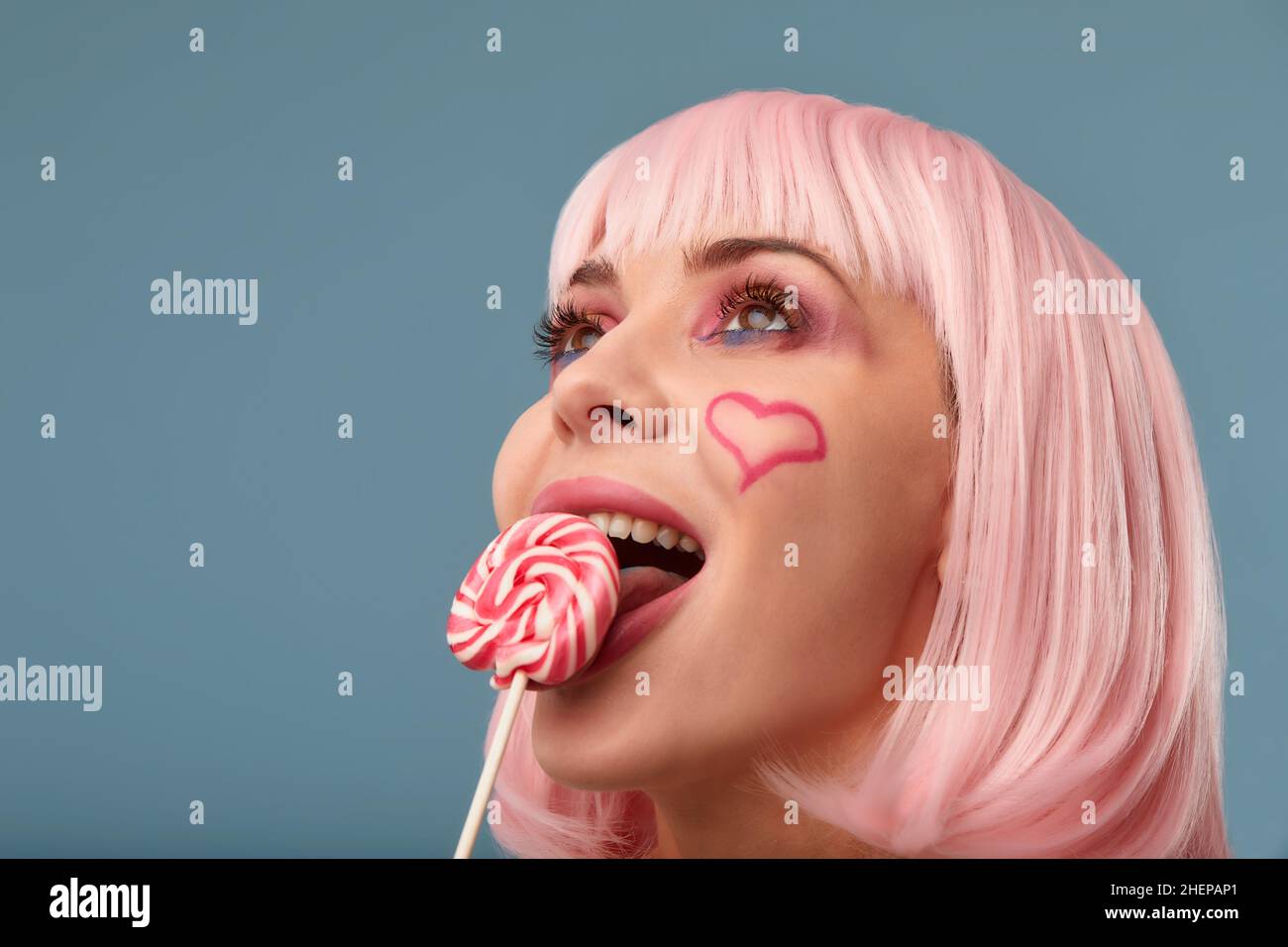 Candy Lolli pop Party Girl posing in white studio. Role-playing games ...