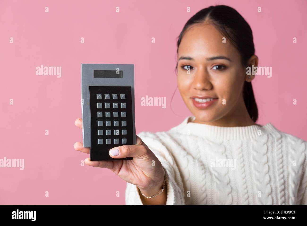 Girl with calculator hi-res stock photography and images - Alamy