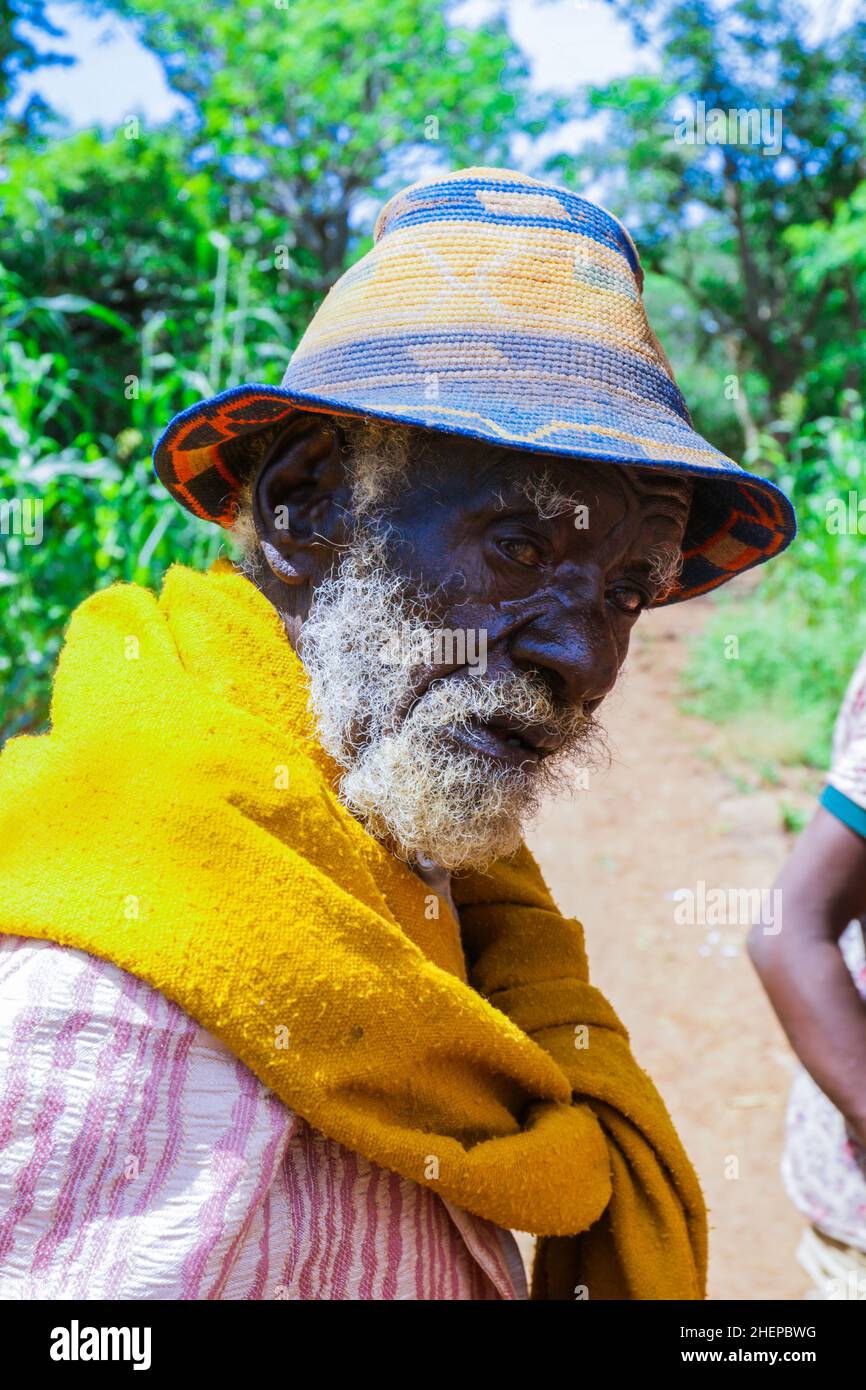 Close up portrait of African Konso Old Man with Bright Yellow Clothes ...