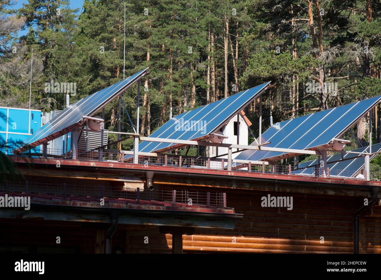 Solar panels on a red roof - alternative electricity source - concept ...