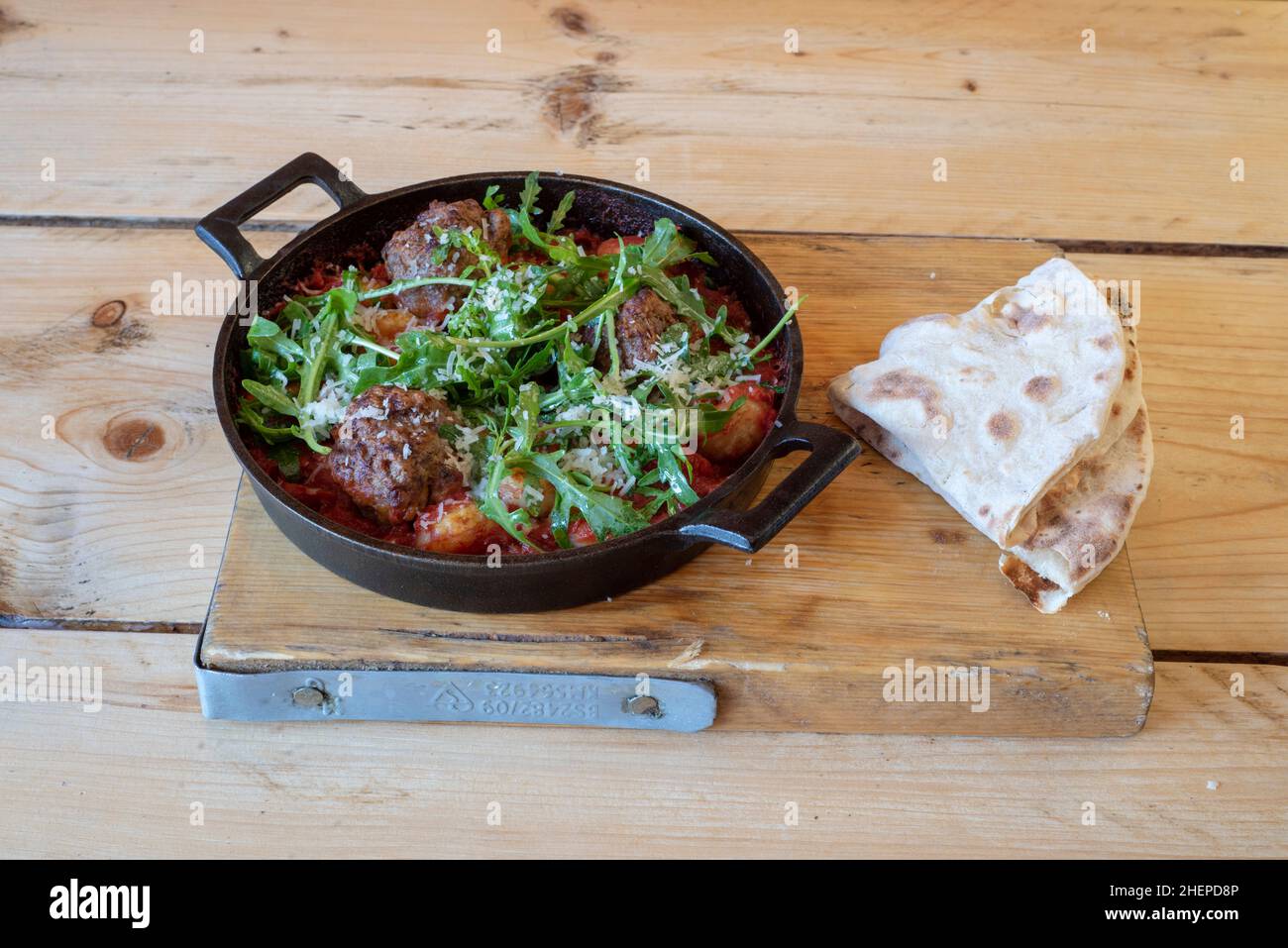 Italian Sizzler meatballs & gnocchi in tomato Bolognaise sauce served ...