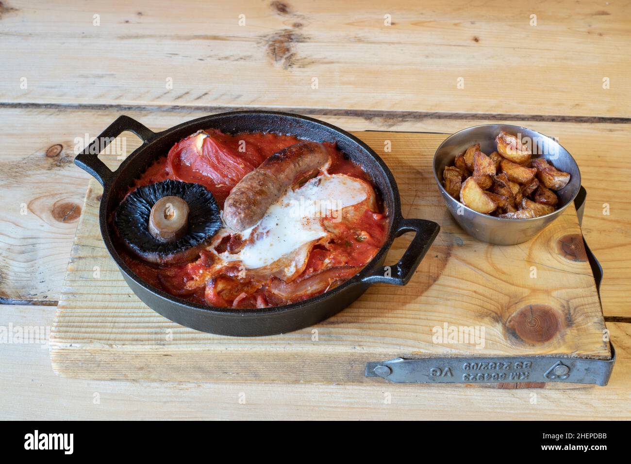 All Day Breakfast Sizzler egg, bacon, sausage & mushroom in tomato ...