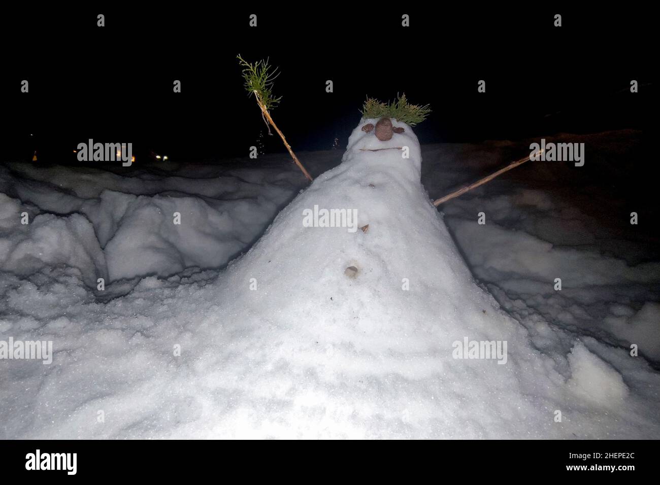 Snow man snow man hand made at night close up Stock Photo - Alamy