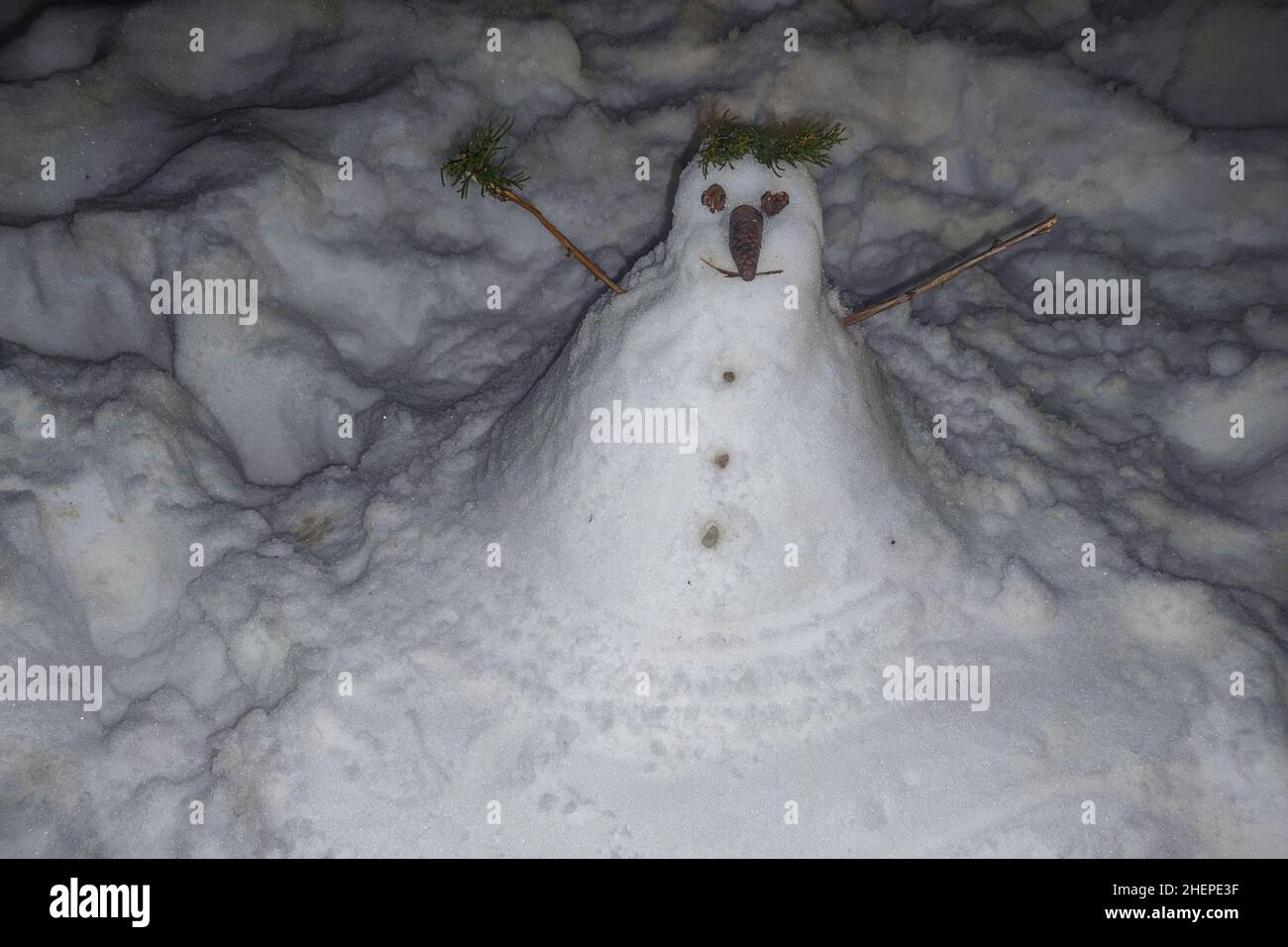 Snow man snow man hand made at night close up Stock Photo - Alamy