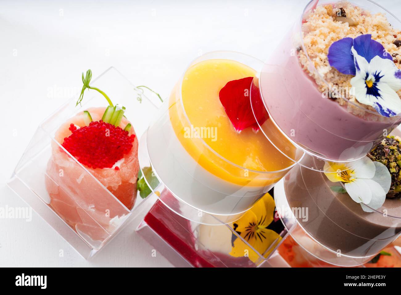 Sweet snacks in clear glasses for events. Catering Stock Photo - Alamy