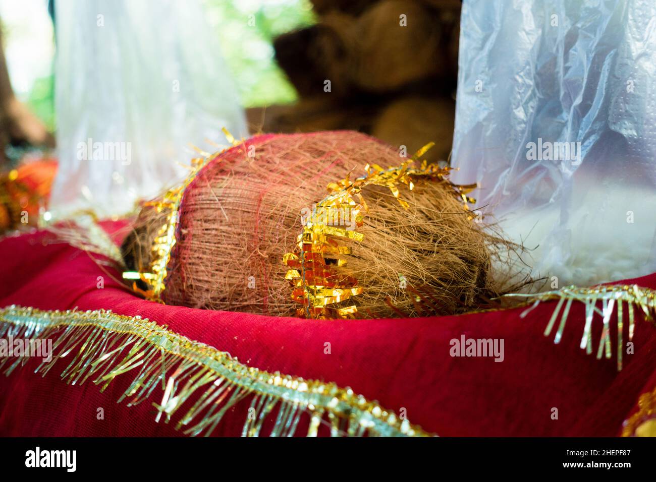 Coconuts in temple. Coconut represents Hindu trinity of Brahma , Vishnu ...